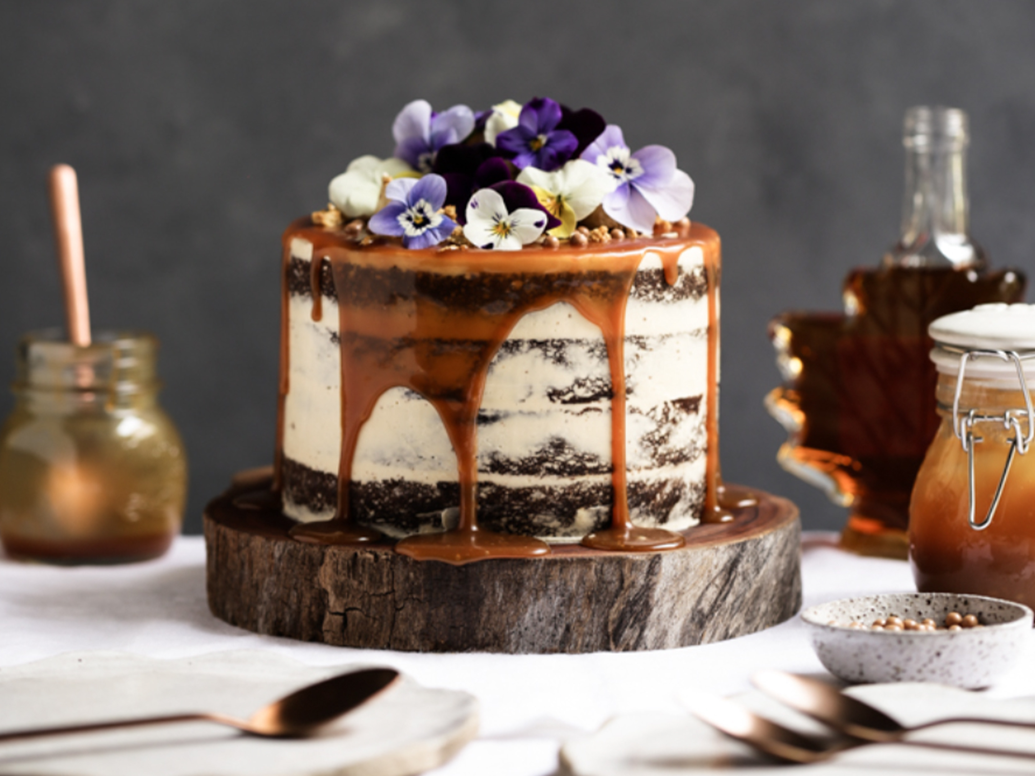 pumpkin spice cake with maple frosting and salted caramel • food ...